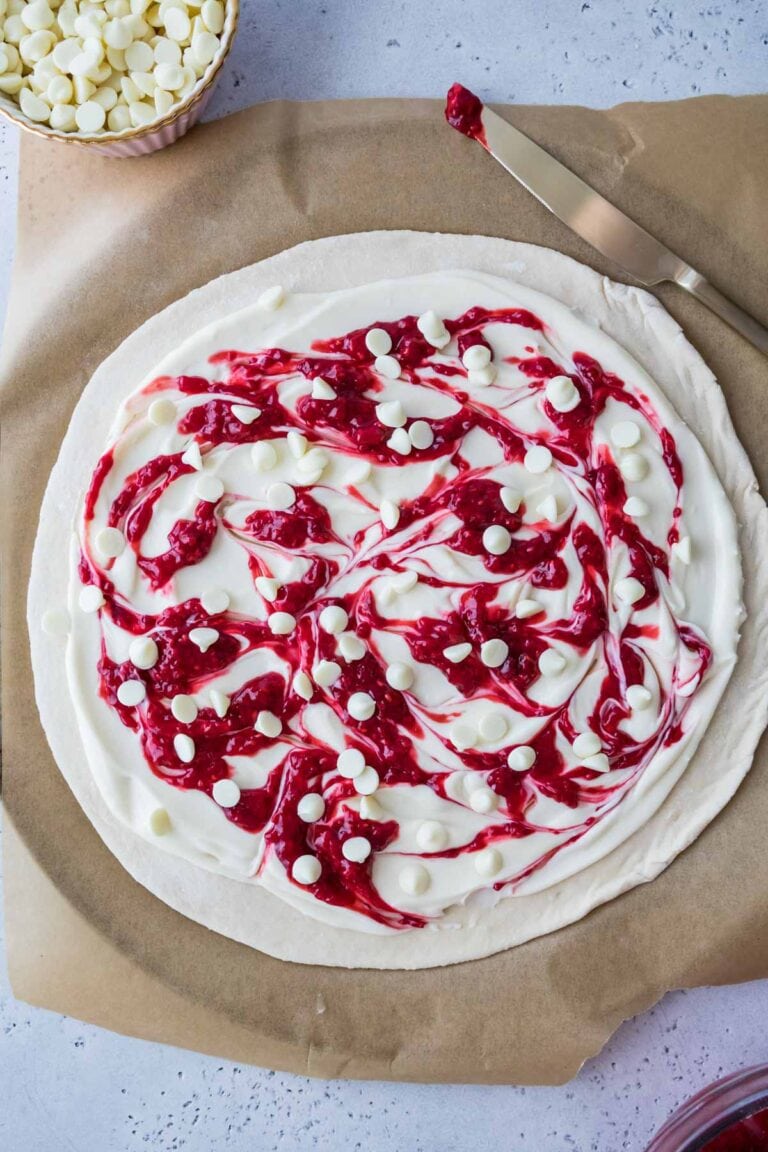 Raspberry Cheesecake Dessert Pizza - Sugar Spun Run